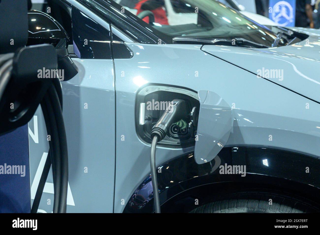 Toronto, ON, Canada - February 14, 2025: Electric vehicle charger ...