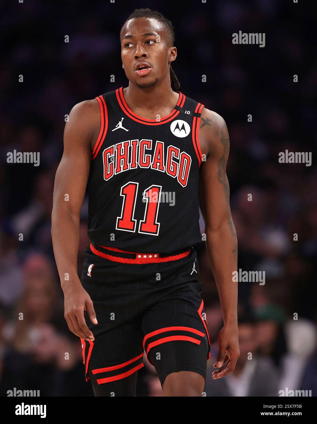 Chicago Bulls' Ayo Dosunmu stands on the court during the first half of ...