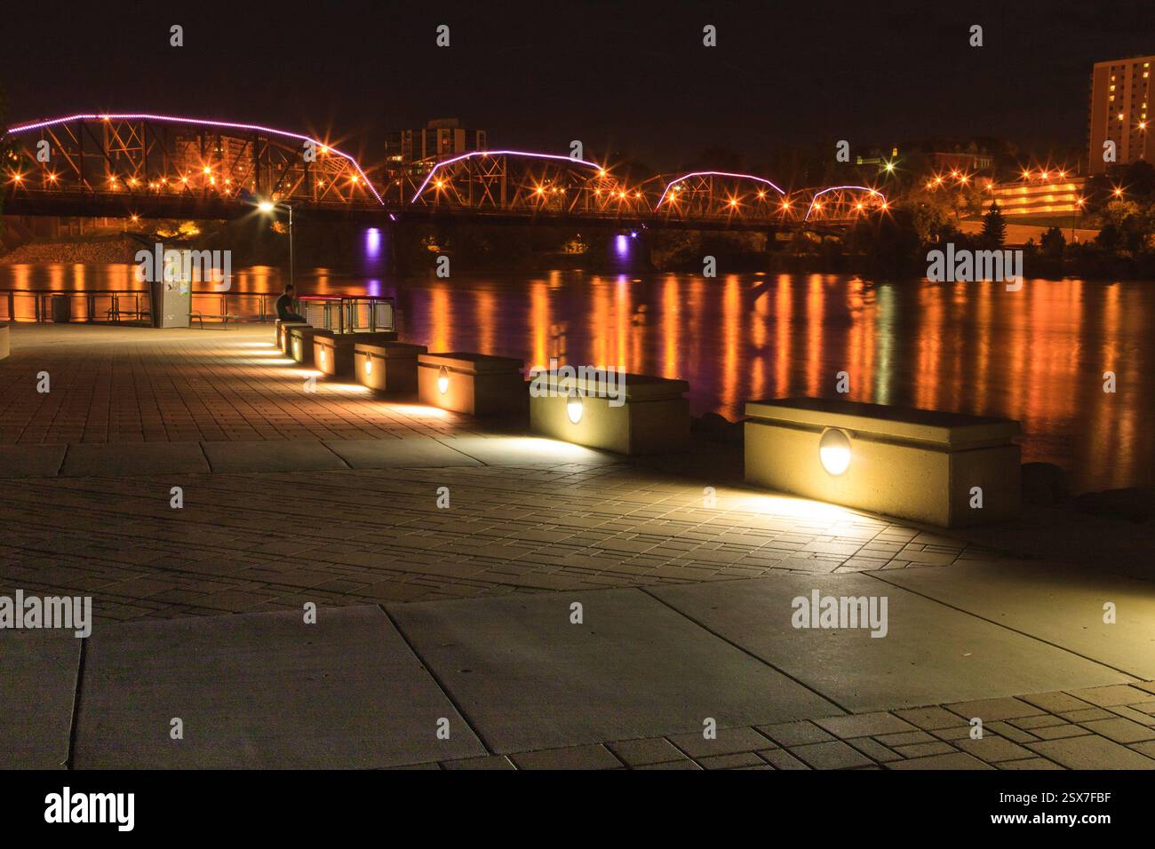 Bridge with lights on it is over a river Stock Photo - Alamy