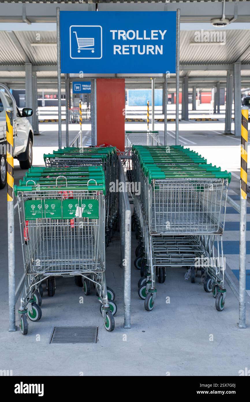 A shopping trolley return station Stock Photo - Alamy