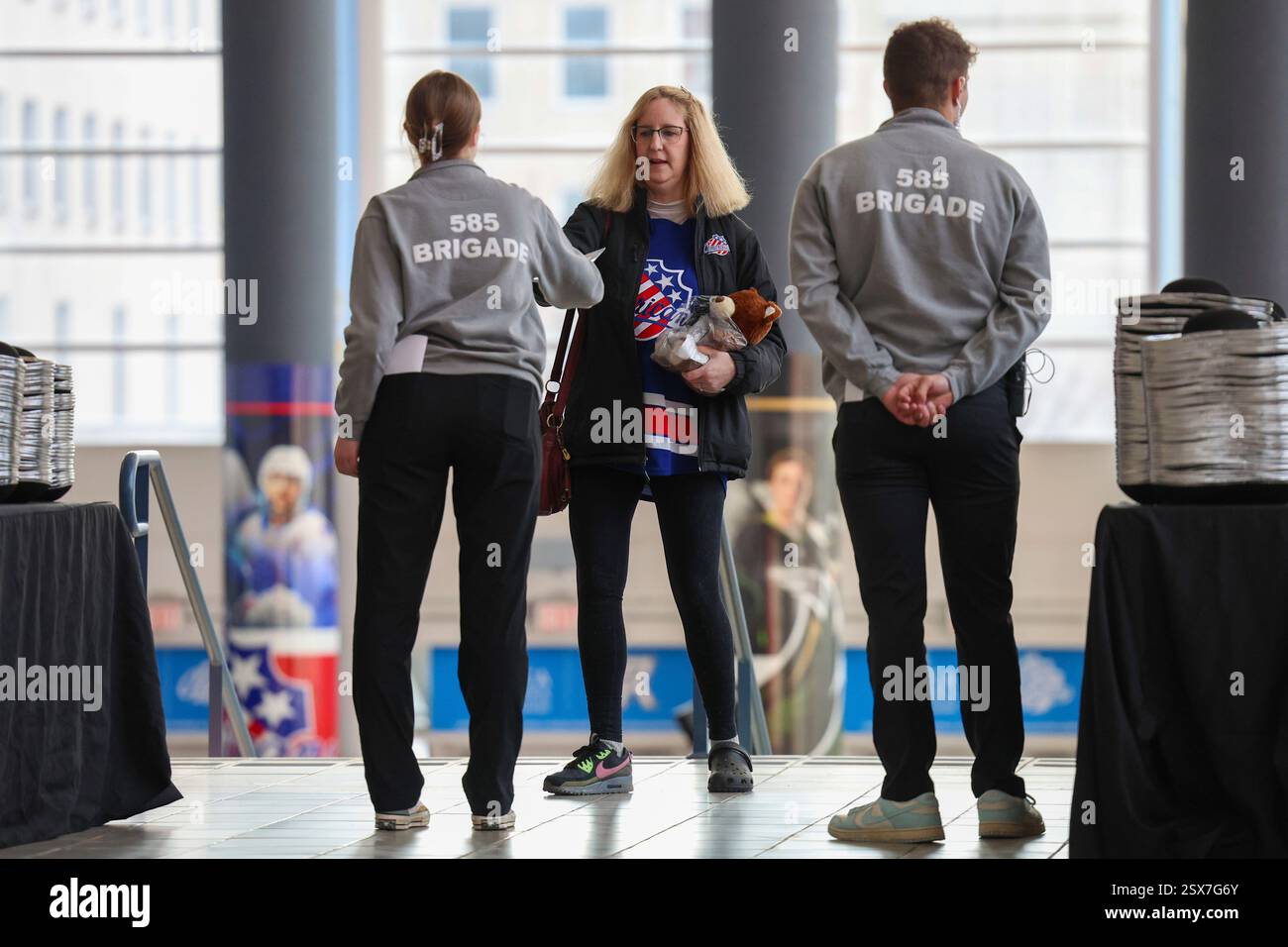 February 21st 2025: A Rochester Americans fan carries stuffed animals ...