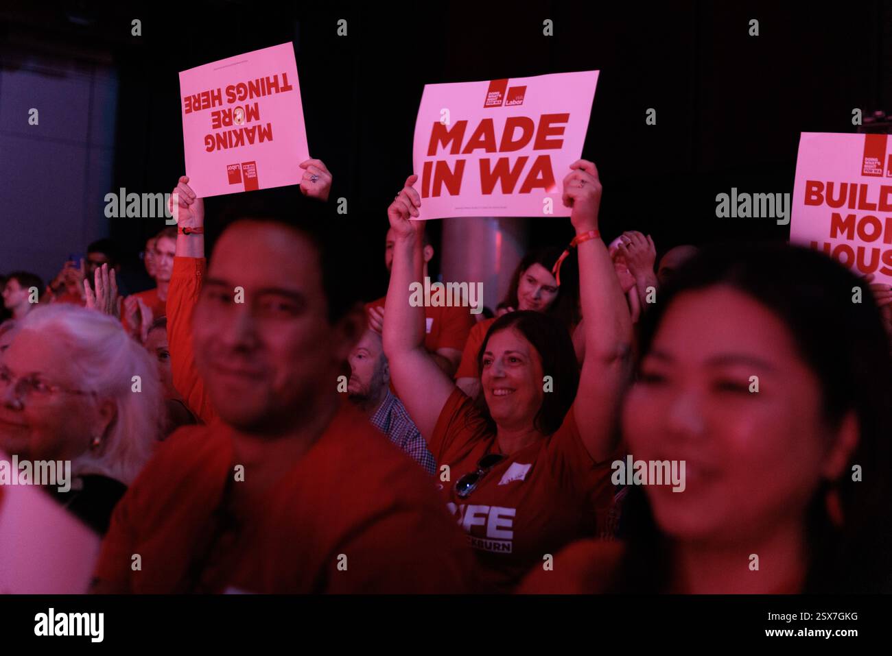 Perth, Australia. 23rd Feb 2025. Labor fans hold up ‘Made in WA' signs ...
