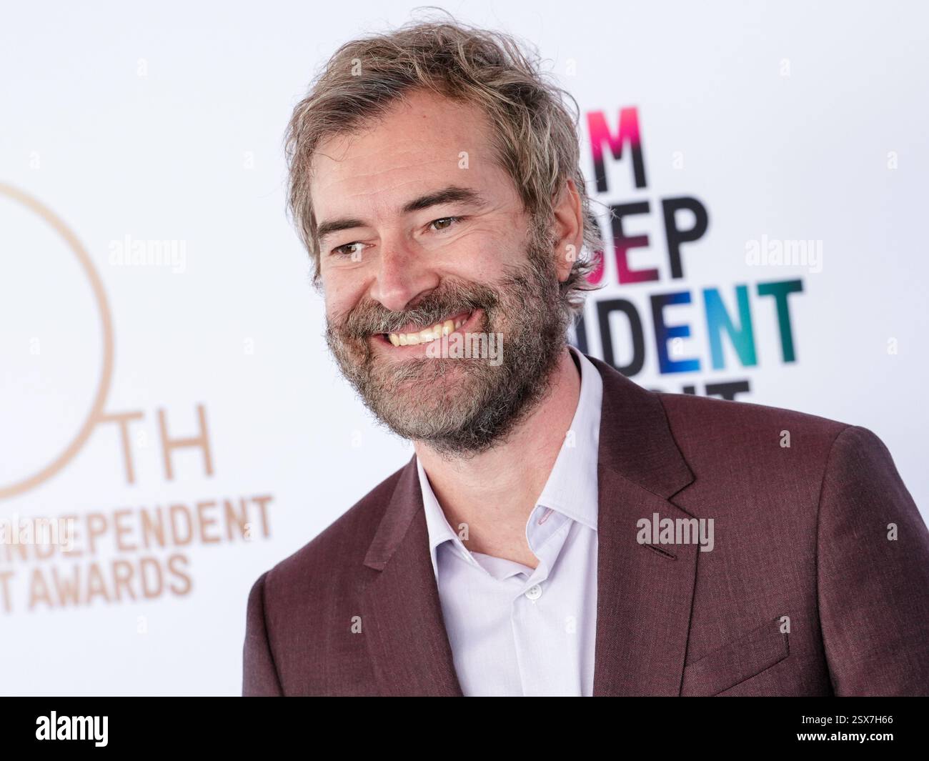 Mark Duplass walking on the red carpet at the 2025 Film Independent ...