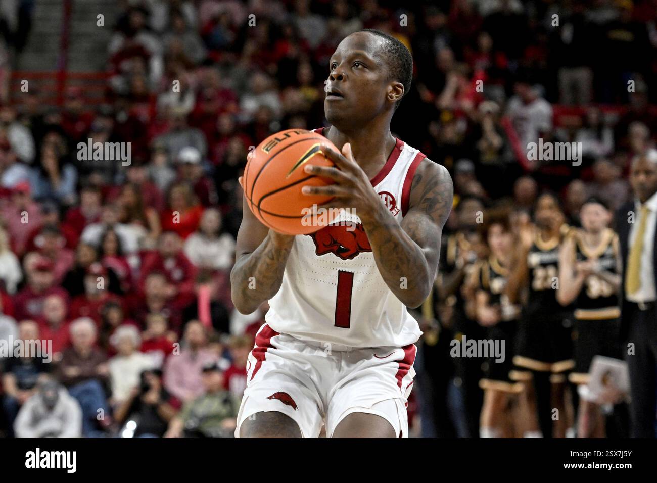 Arkansas guard Johnell Davis (1) looks to shoot a 3-point basket ...