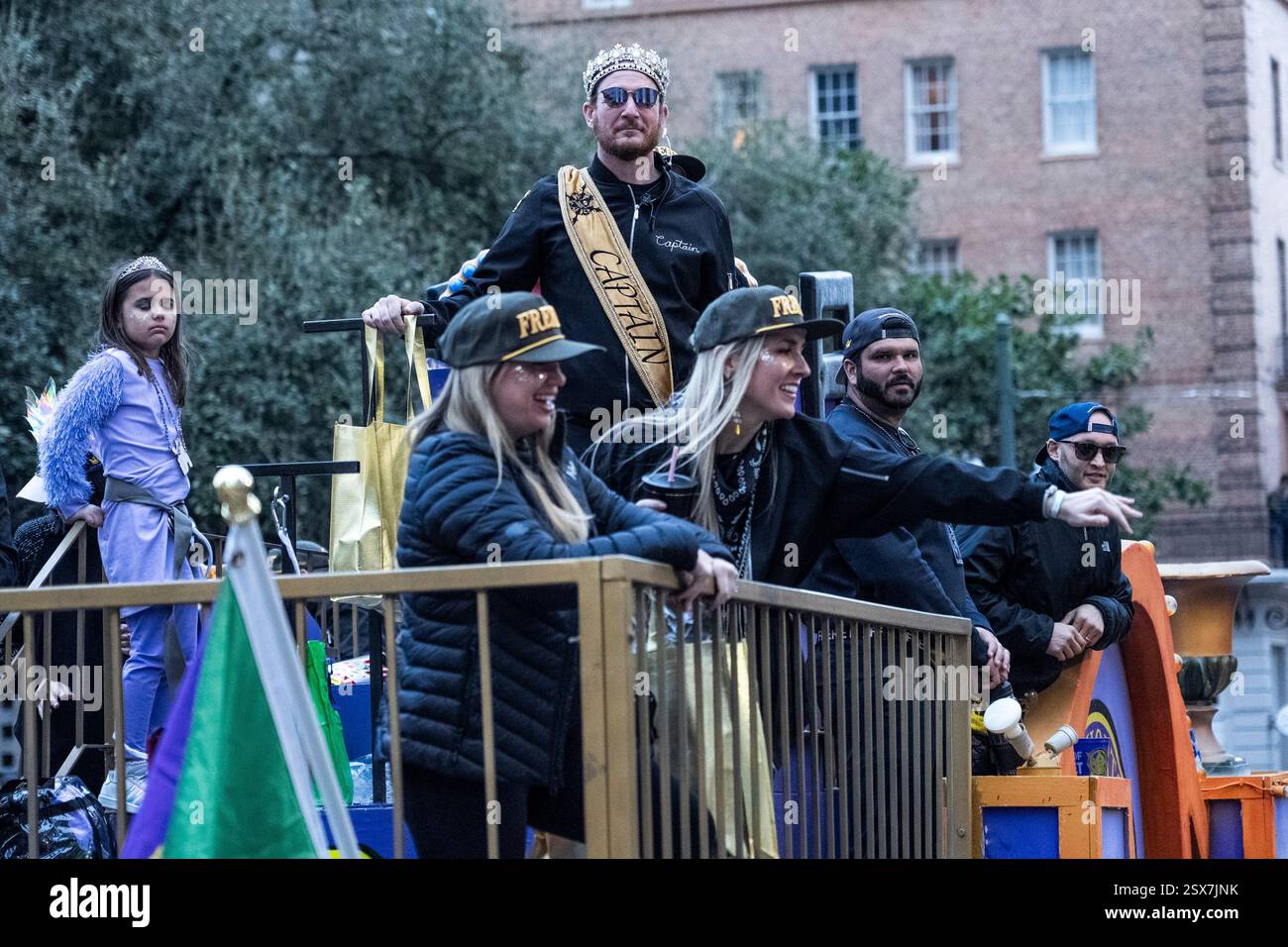 Paradegoers are seen during the Krewe of Freret Mardi Gras Parade in ...