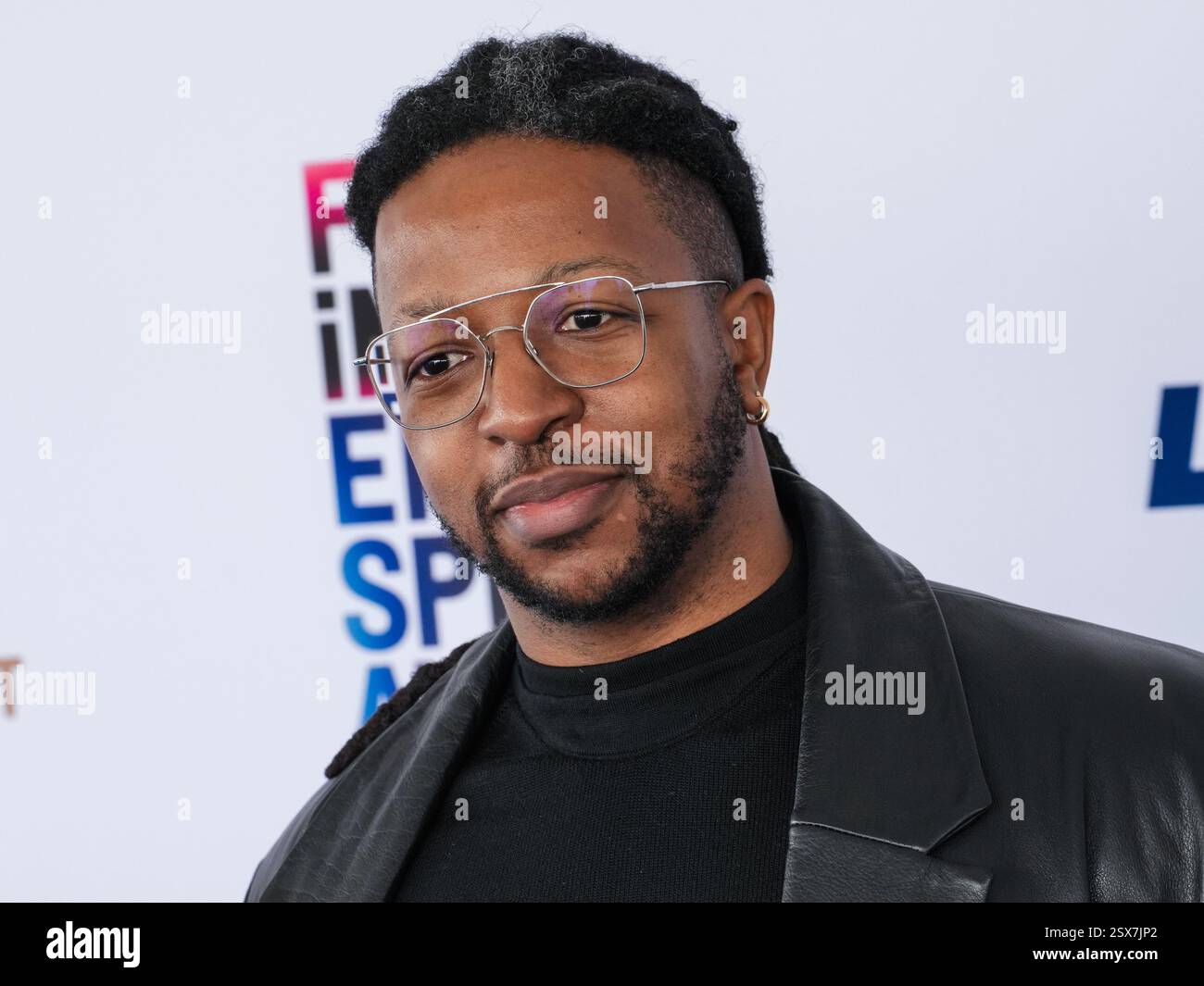 Los Angeles, USA. 22nd Feb, 2025. Jomo Fray walking on the red carpet ...