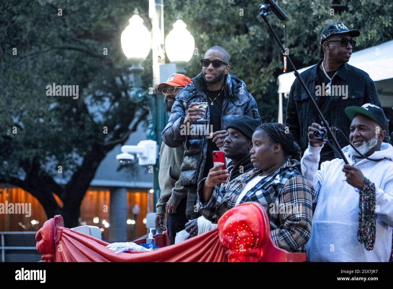 Paradegoers are seen during the Krewe of Freret Mardi Gras Parade in ...