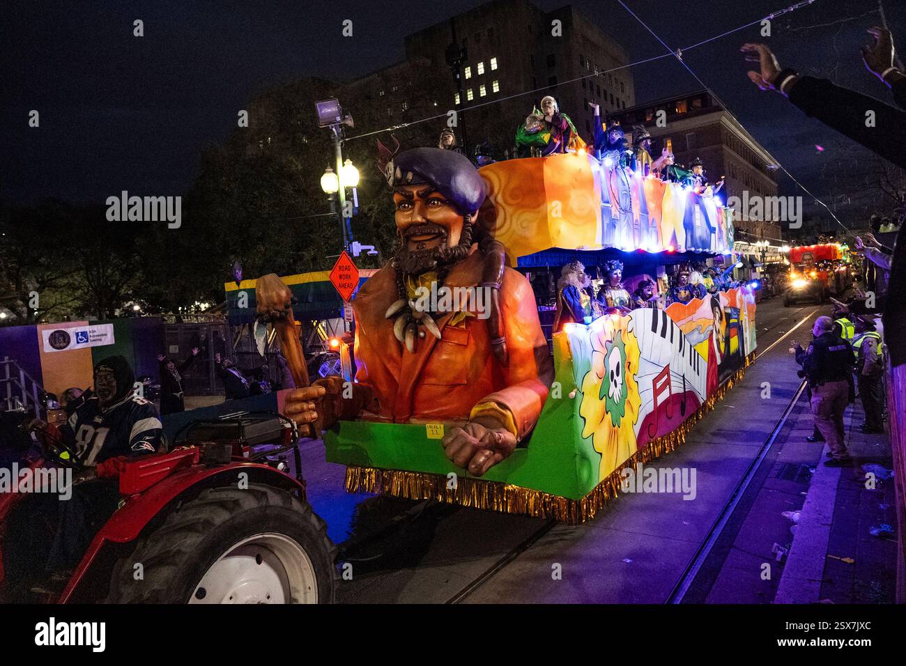 Paradegoers are seen during the Krewe of Freret Mardi Gras Parade in ...