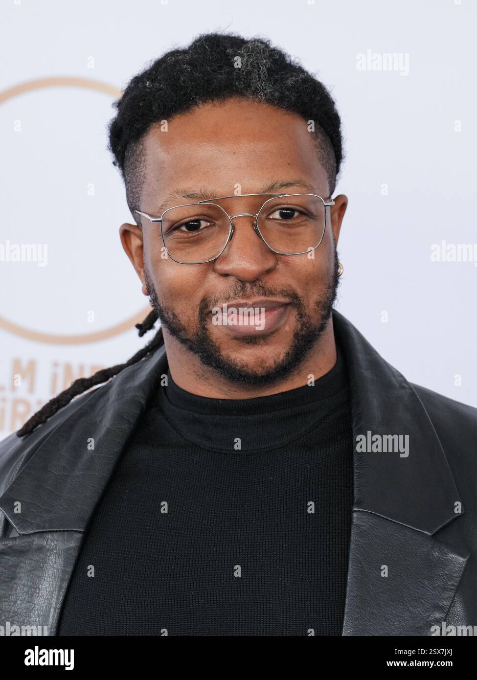 Los Angeles, USA. 22nd Feb, 2025. Jomo Fray walking on the red carpet ...