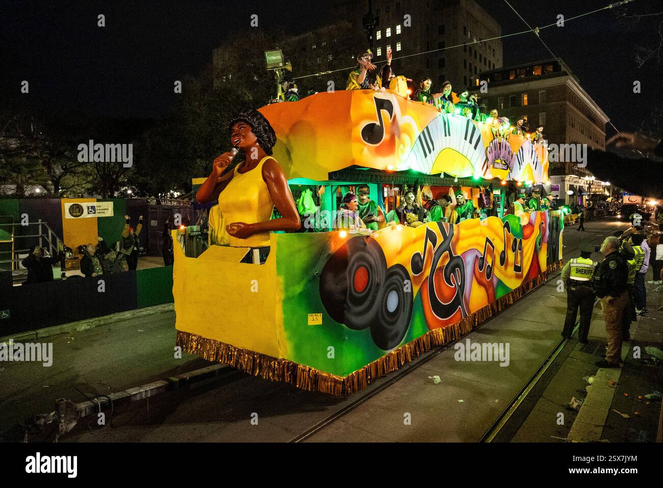 Paradegoers are seen during the Krewe of Freret Mardi Gras Parade in ...