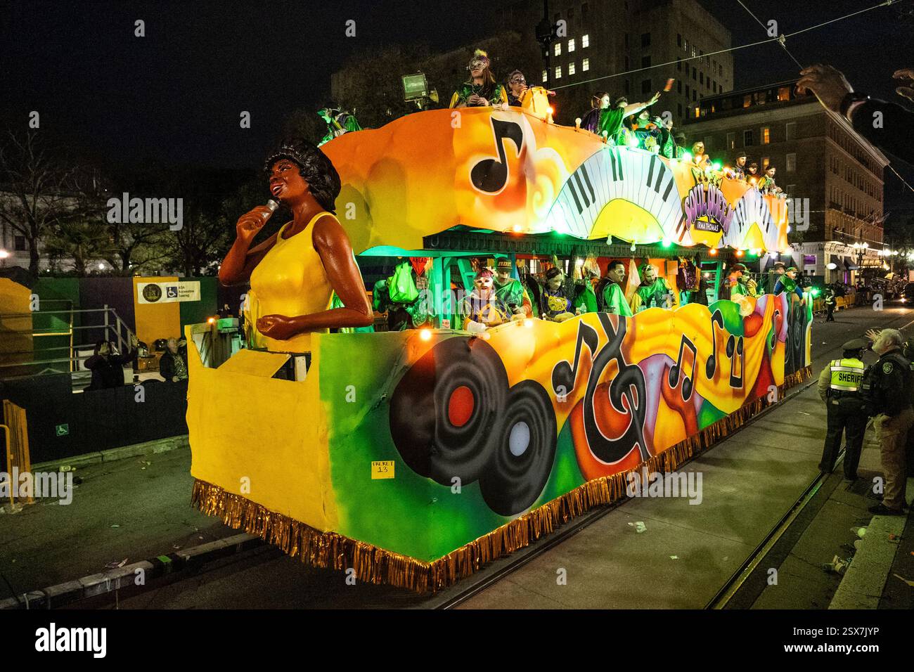 Paradegoers are seen during the Krewe of Freret Mardi Gras Parade in ...