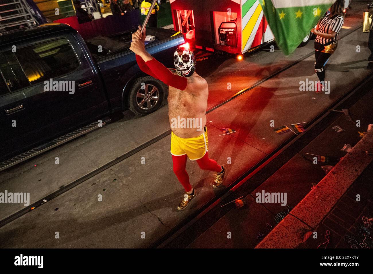 Paradegoers are seen during the Krewe of Freret Mardi Gras Parade in ...