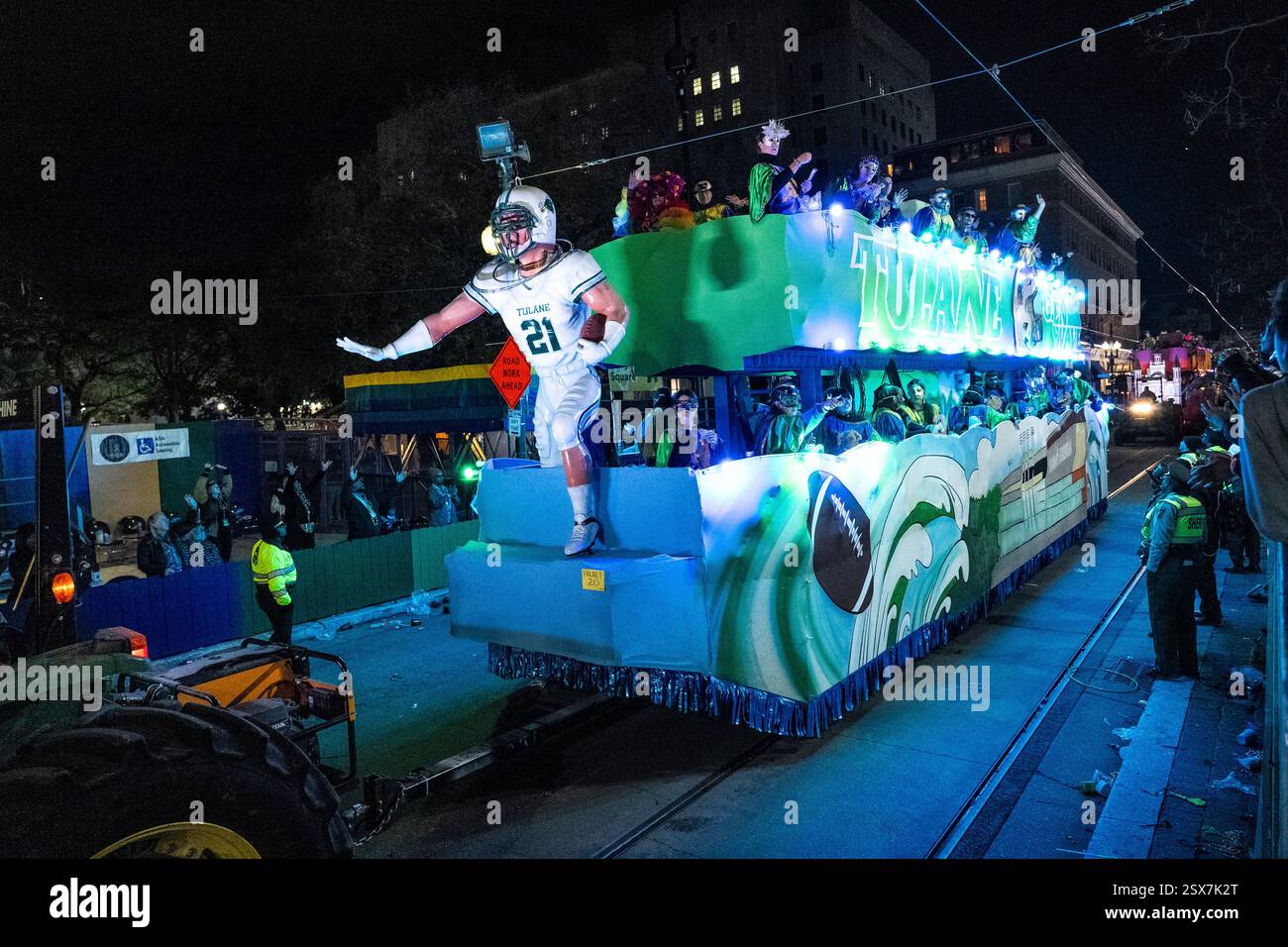 Paradegoers are seen during the Krewe of Freret Mardi Gras Parade in ...