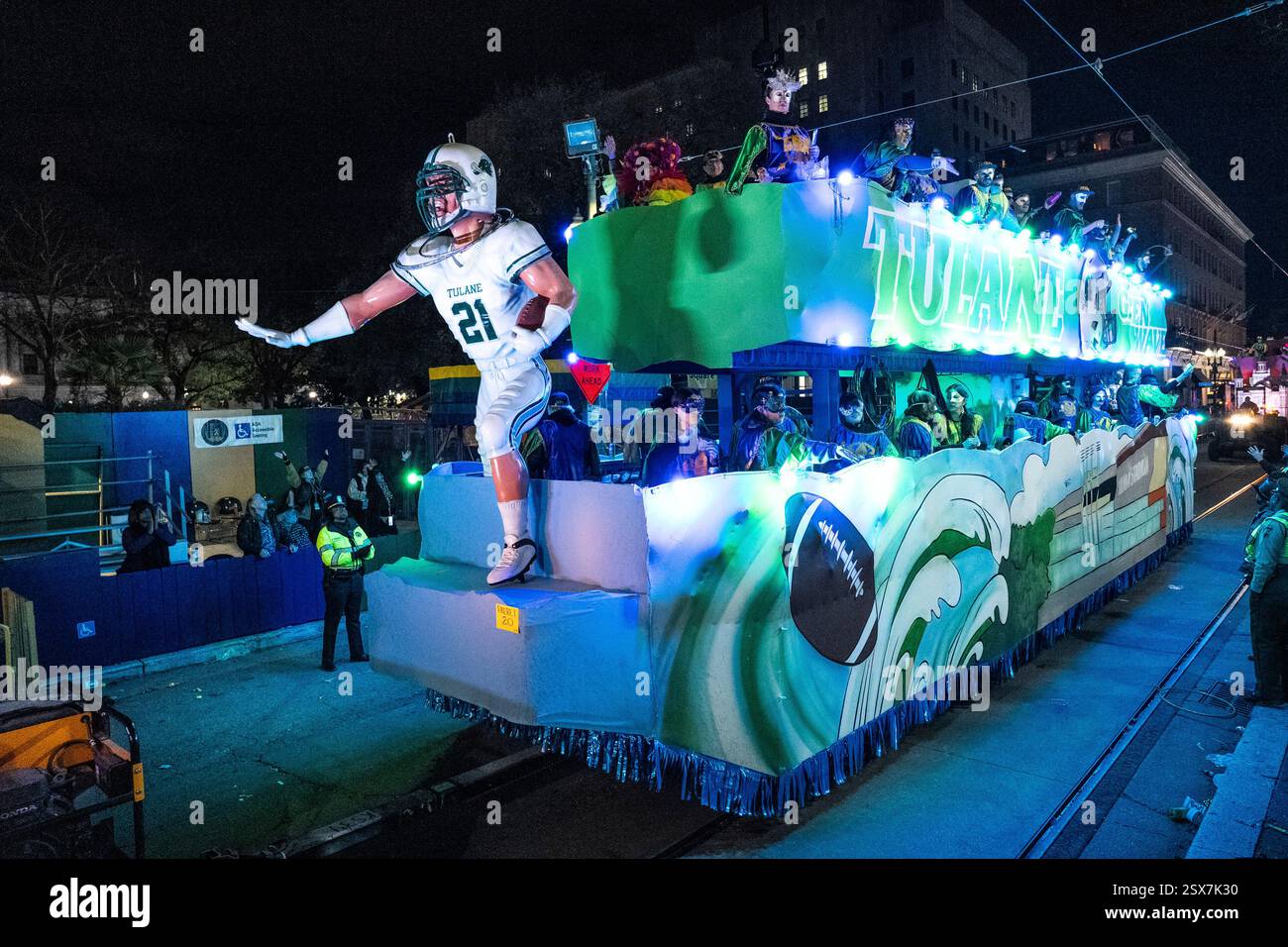Paradegoers are seen during the Krewe of Freret Mardi Gras Parade in ...
