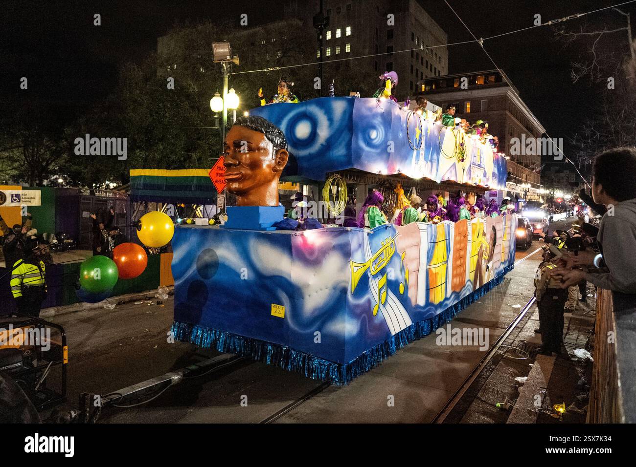 Paradegoers are seen during the Krewe of Freret Mardi Gras Parade in ...