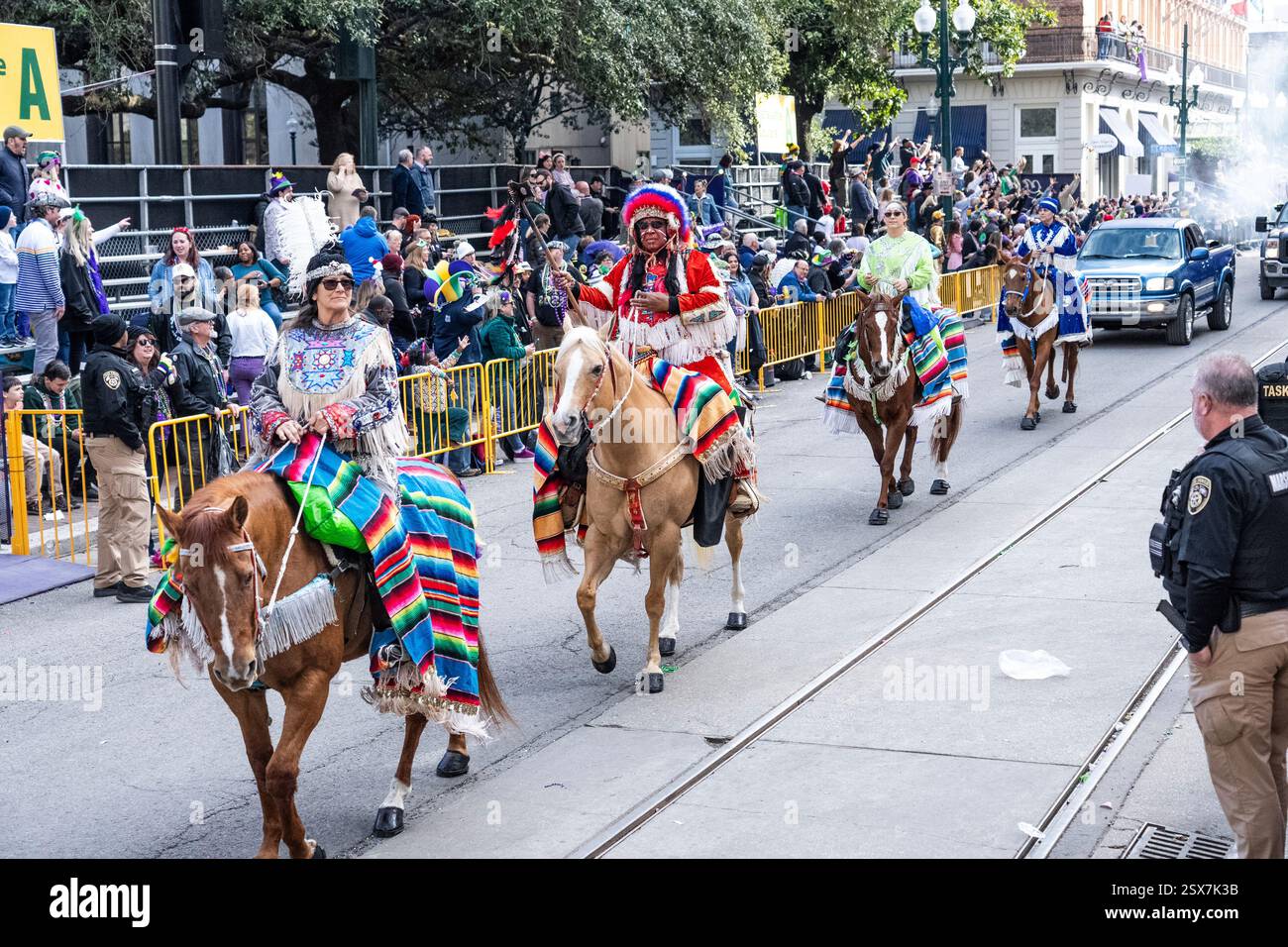 Paradegoers are seen during the Legion of Mars Parade Mardi Gras Parade ...