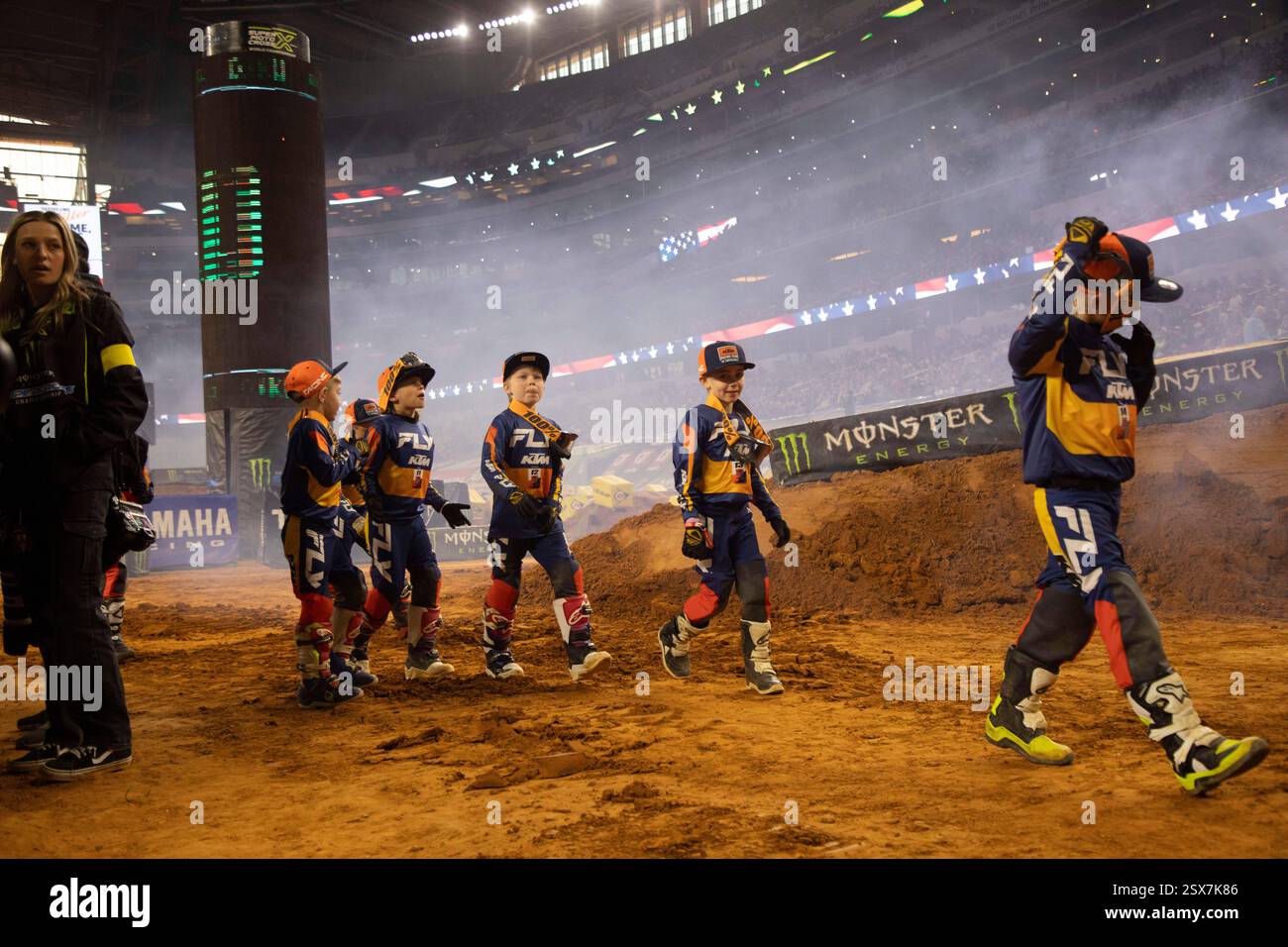 February 22, 2025, Arlington, Texas, USA: KTM Junior racers walk out on ...
