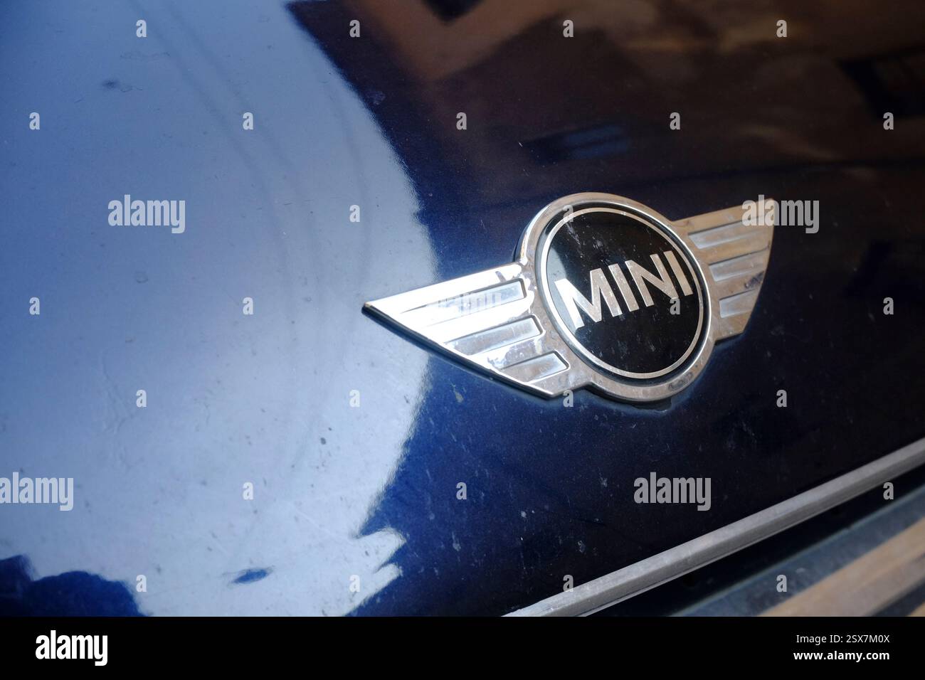 Cremona, Italy February 9th 2025 Shiny chrome MINI logo reflecting on a ...