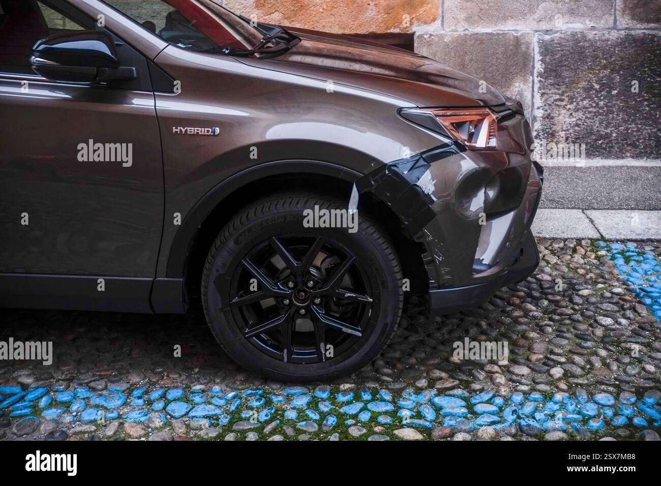 Cremona, Italy February 9th 2025 Front right side of a damaged metallic ...