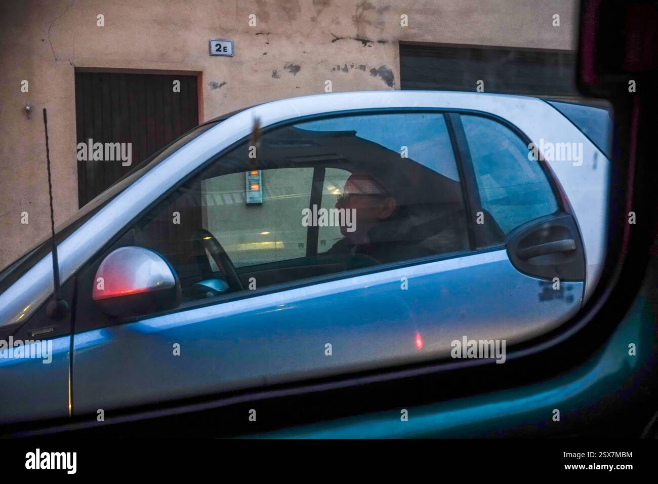 Cremona, Italy February 9th 2025 Man driving a smart fortwo coupe MHD ...