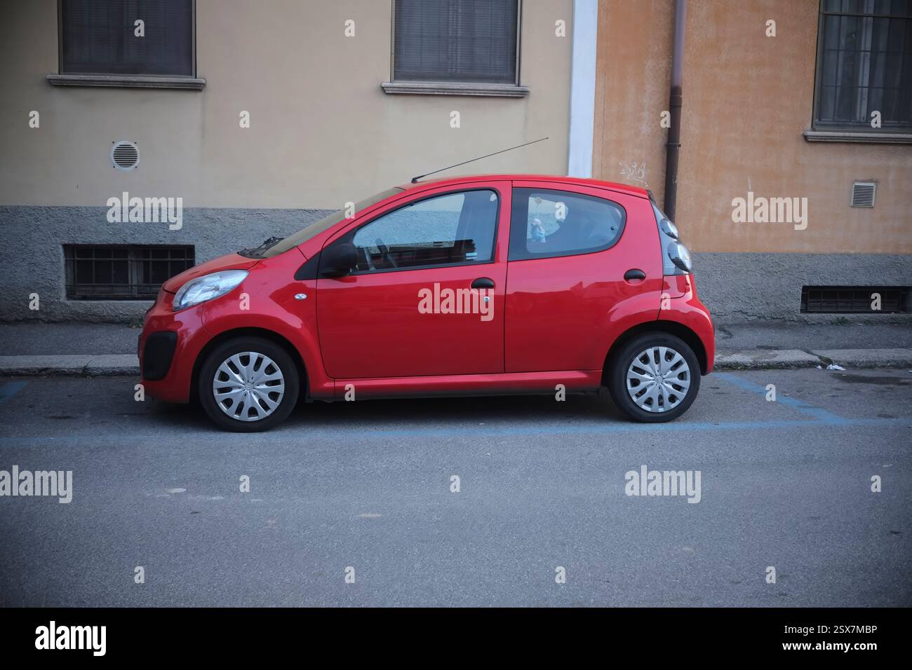 Cremona, Italy February 9th 2025 Bright red Citroen C1 city car parked ...