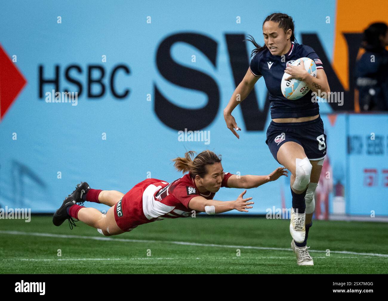 Japan's Ria Anoku dives after United States' Alex Sedrick during ...