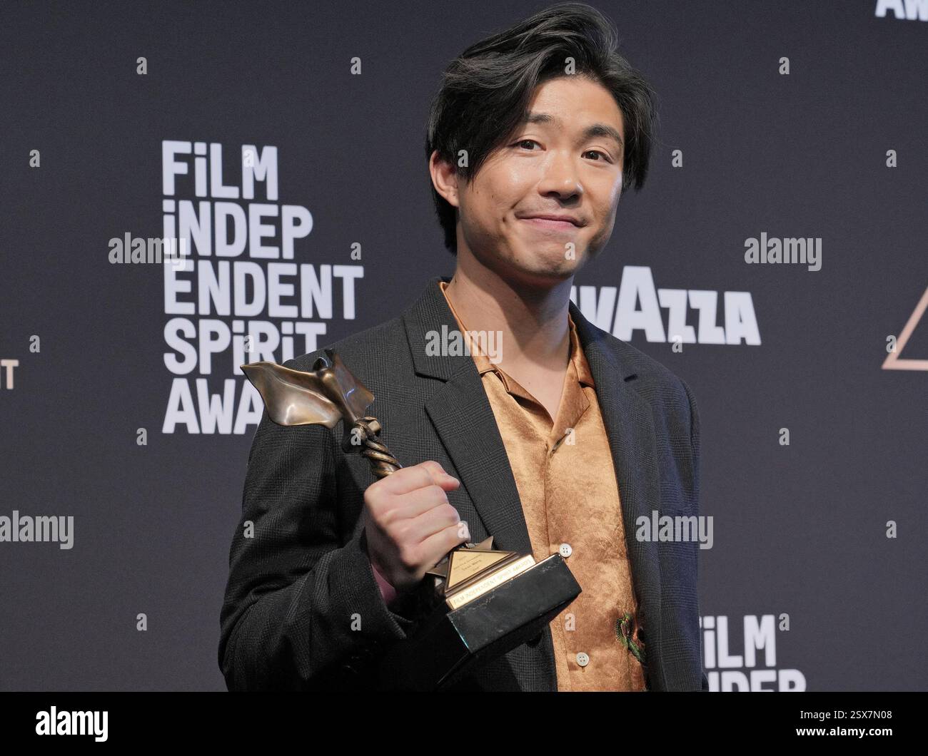 Sean Wang, winner of the Best First Screenplay award for "Dìdi" pose in ...