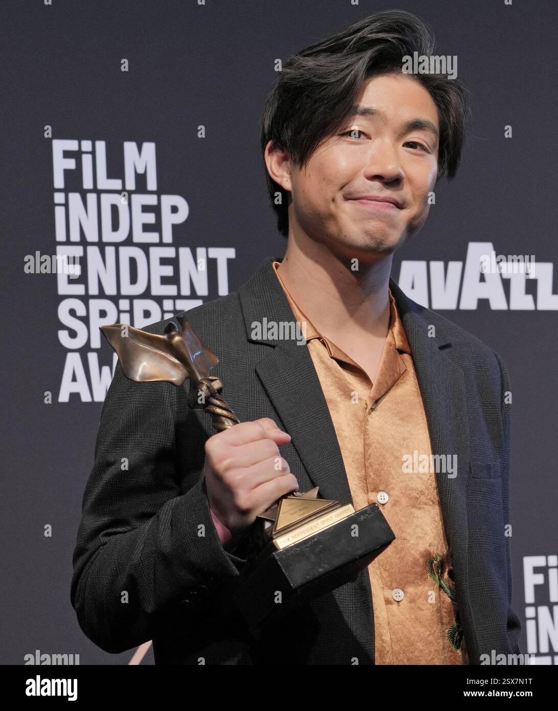 Sean Wang, winner of the Best First Screenplay award for "Dìdi" pose in ...