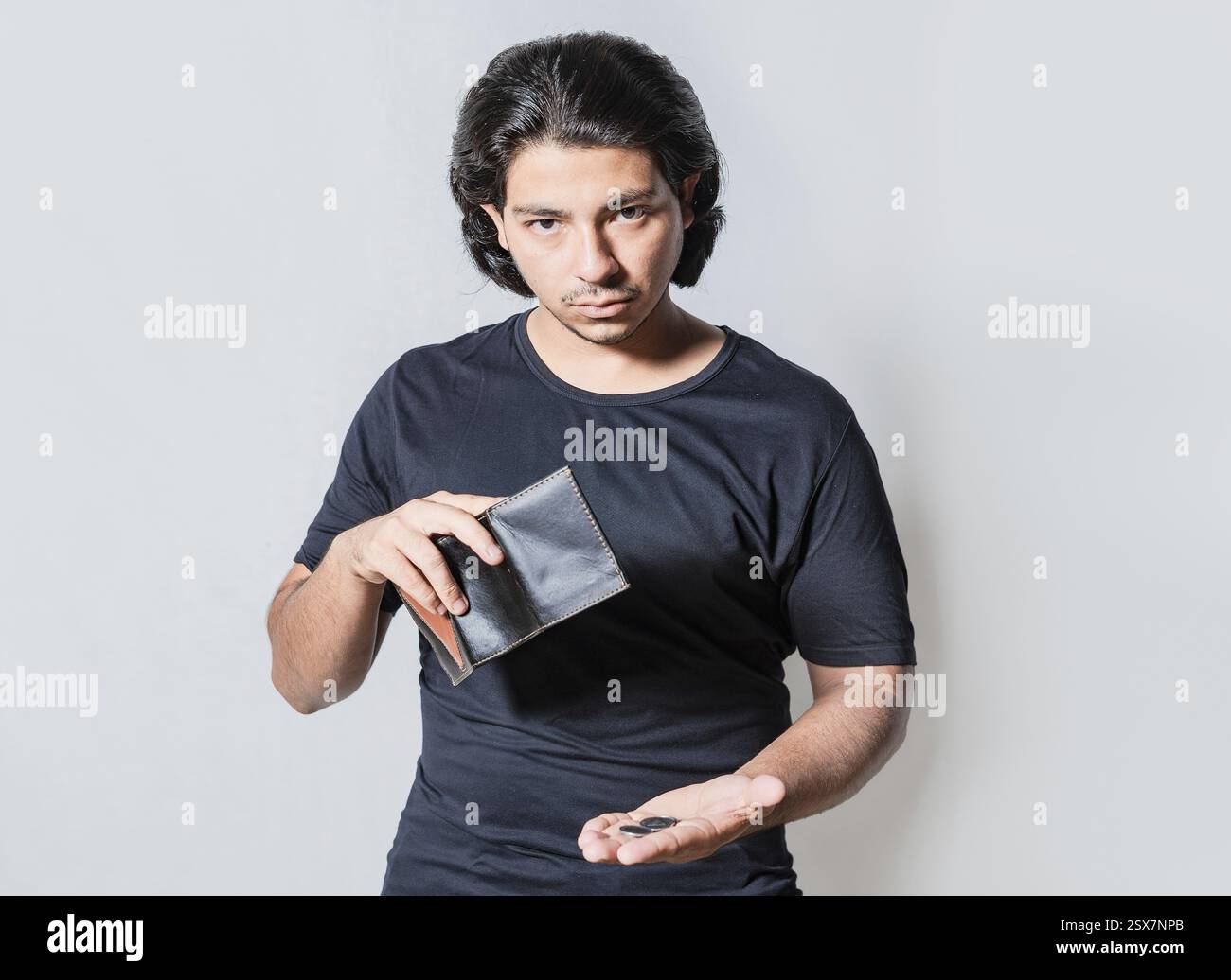 Person with financial crisis holding wallet isolated. Sad man holding empty wallet. Unhappy man ...