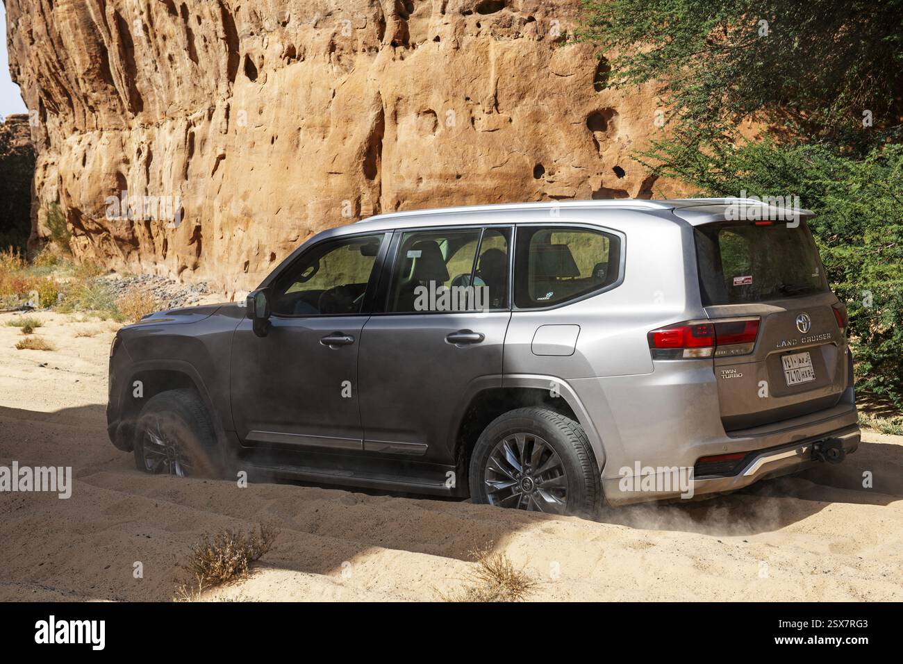 Jeep tour on a sandy track to Madakheel Gorge in Sharaan National Park ...