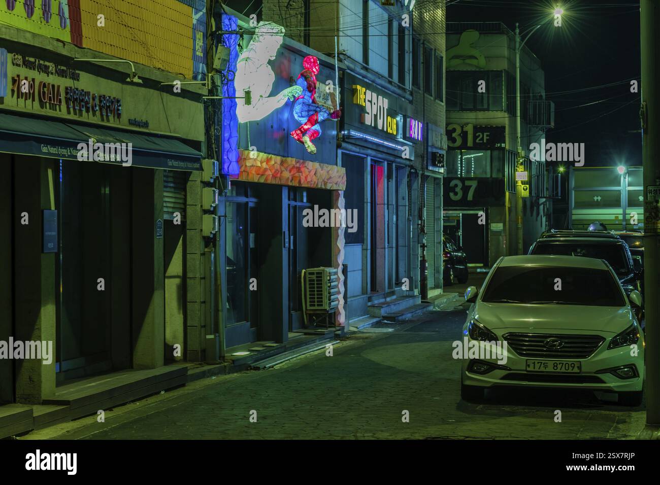 Night view of cars parked on empty street in Bosam-dong. The Hulk ...