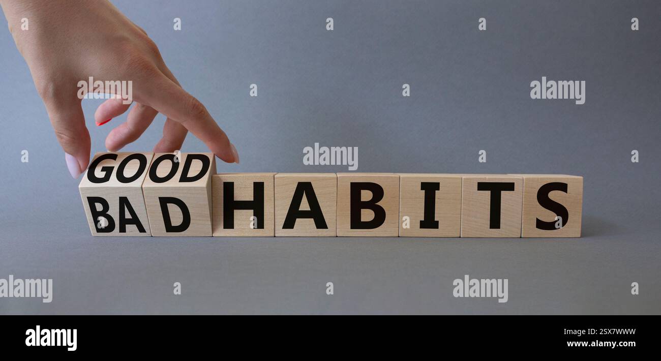 Good and bad Habits symbol. Businessman hand Turnes wooden cubes and ...