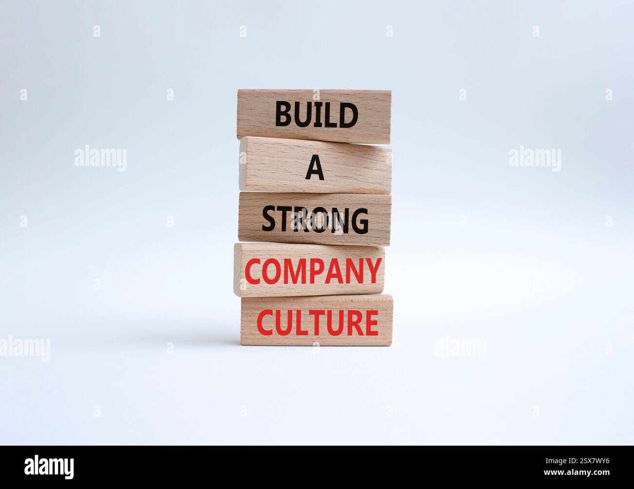 Company culture symbol. Wooden blocks with words Build a strong company ...
