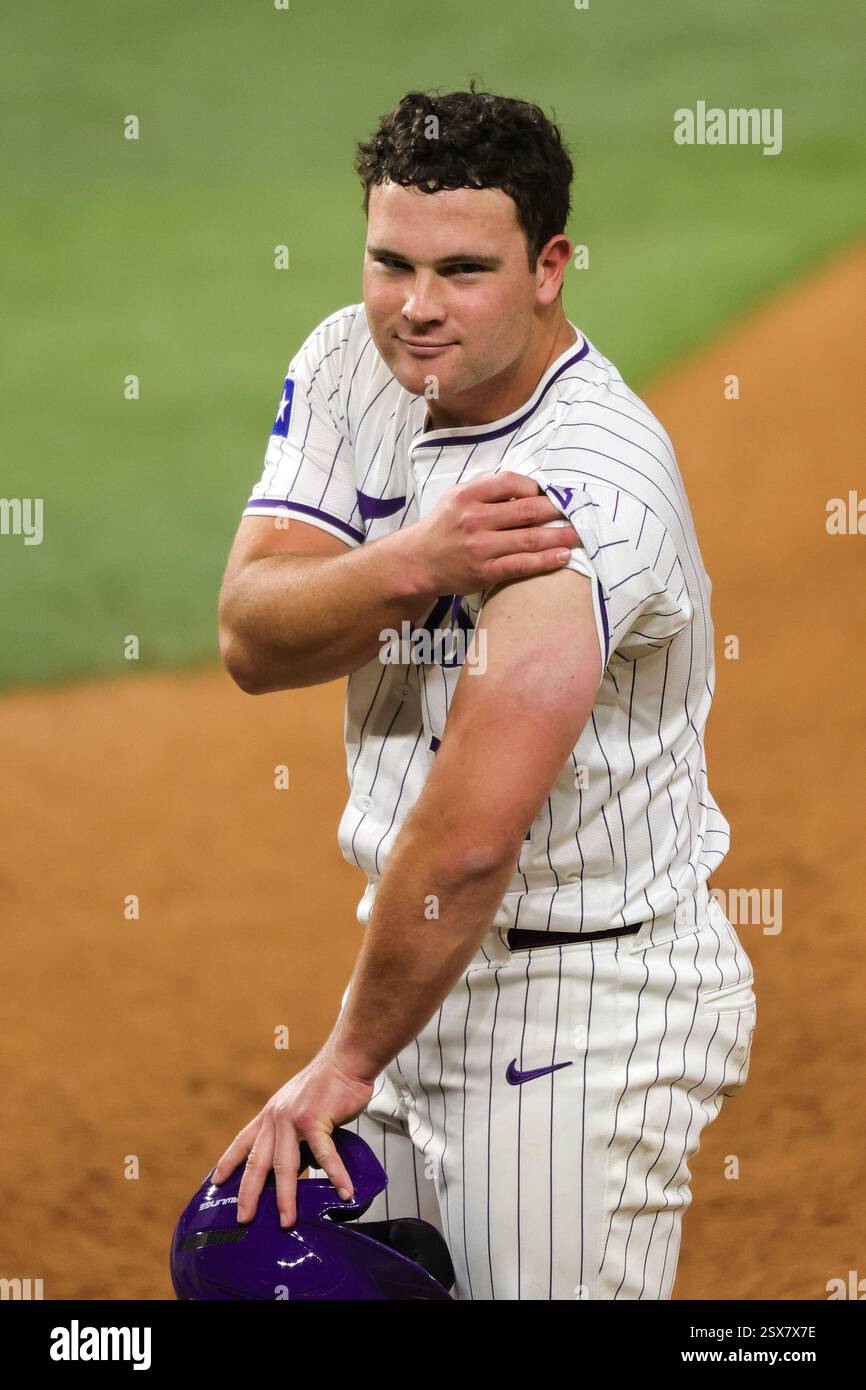 February 22, 2025: Karson Bowen (14) Horned Frogs catcher raises his ...