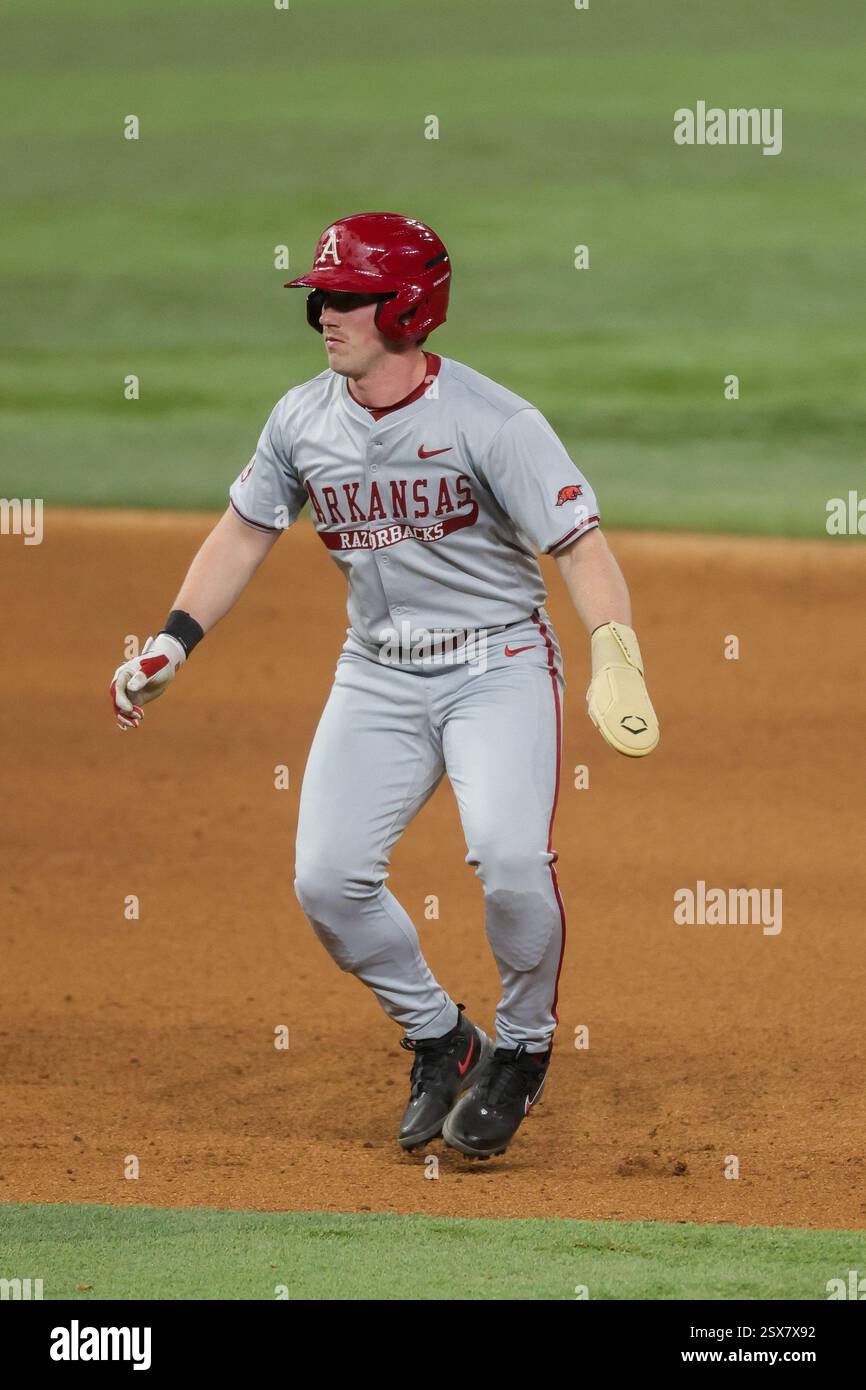 February 22, 2025: Logan Maxwell (22) Arkansas base runner looks to ...