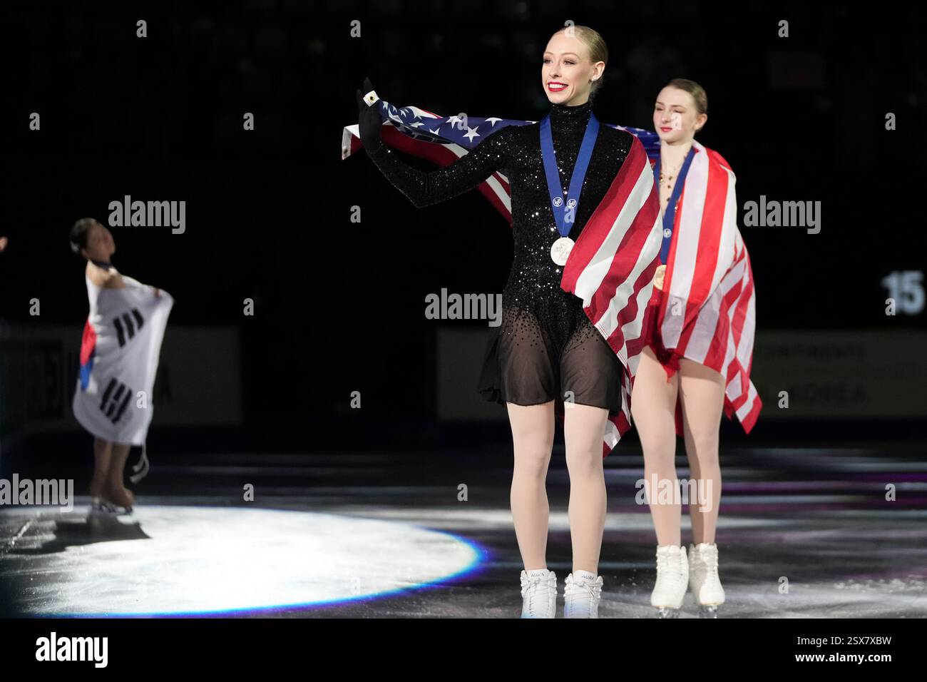 Gold medalist Kim Chae-yeon of South Korea, rear left, silver medalist ...