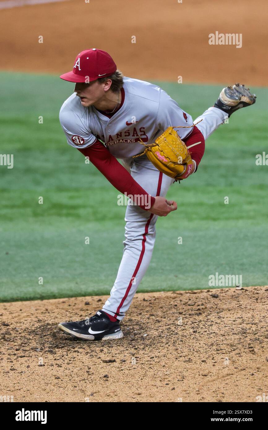 February 22, 2025: Christian Foutch (26) of Arkansas finishes his ...