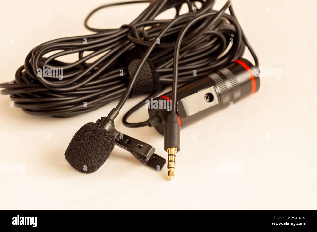 clip-on microphone and long cable Stock Photo - Alamy