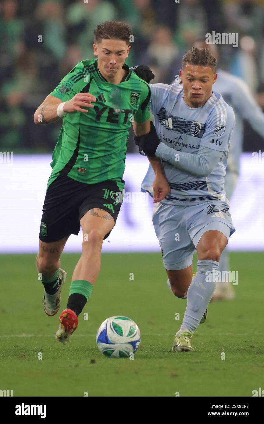 Austin FC forward CJ Fodrey (19), left, and Sporting Kansas City ...