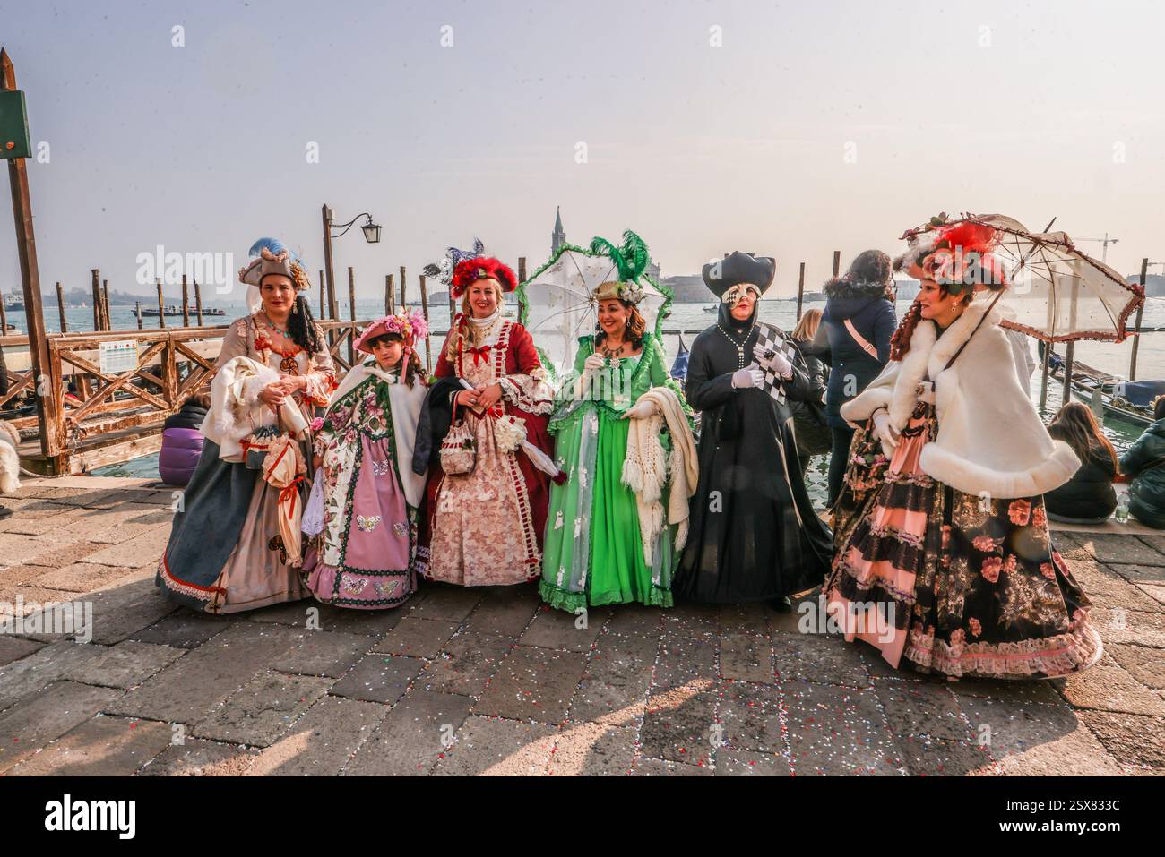 Venice, Italy. 23rd Feb, 2025. Carnival goers dressed in splendid ...