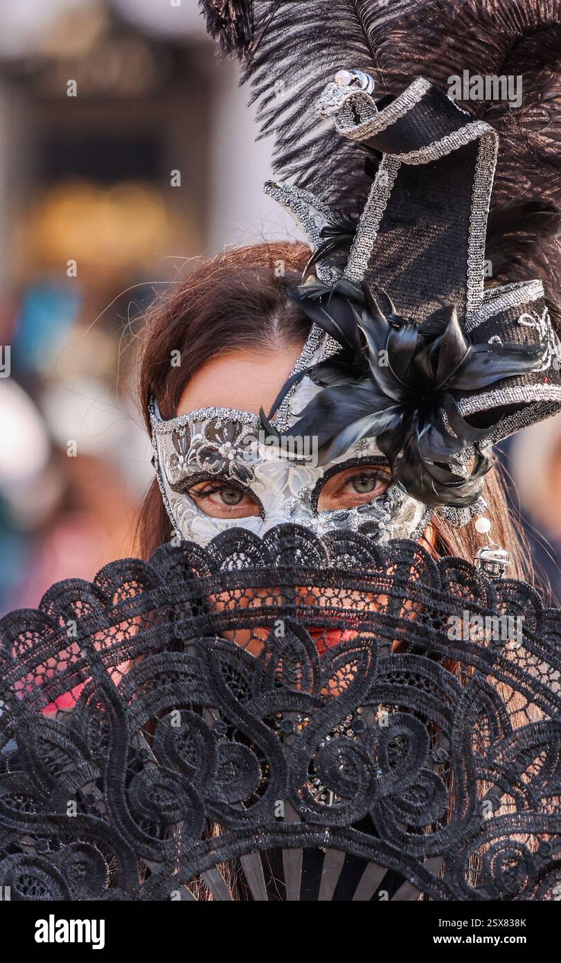 Venice, Italy. 23rd Feb, 2025. Carnival goers dressed in splendid ...