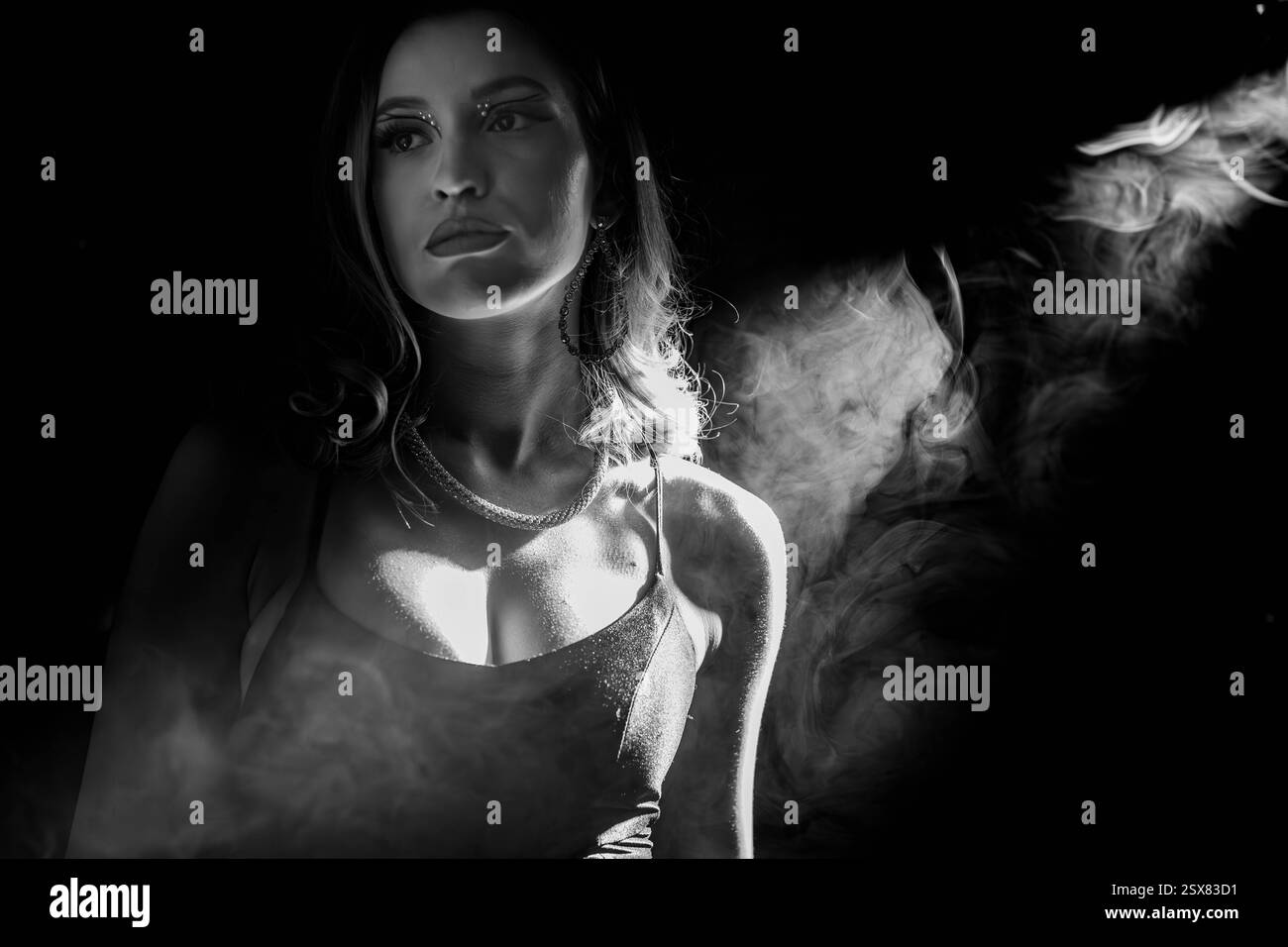 This is a Dramatic Portrait in Black and White featuring a Smoky ...