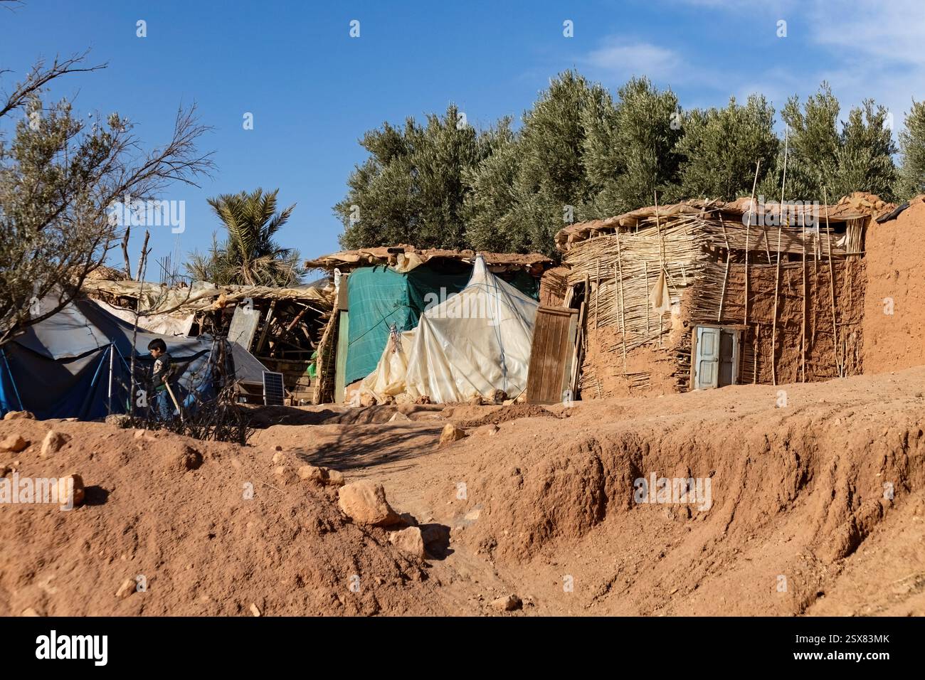 Traditional berber village poor houses in Atlas mountains Morocco Stock ...
