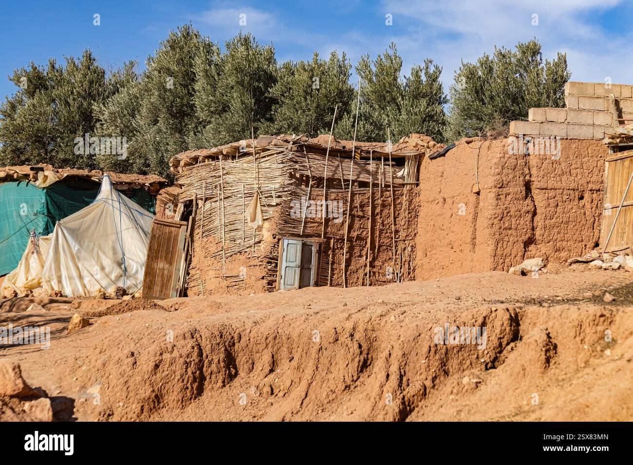 Traditional berber village poor houses in Atlas mountains Morocco Stock ...