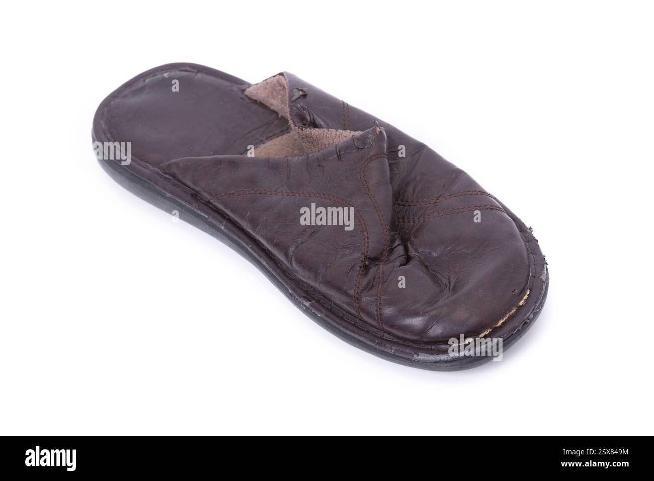 Old worn leather slippers isolated on white background Stock Photo - Alamy