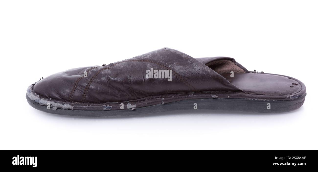 Old worn leather slippers isolated on white background Stock Photo - Alamy