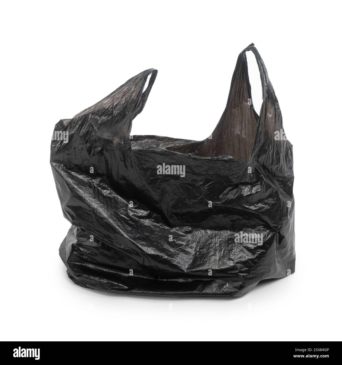 Black empty plastic bag isolated on white background Stock Photo - Alamy