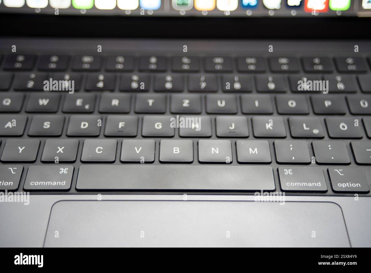Dark German keyboard on a laptop Stock Photo - Alamy