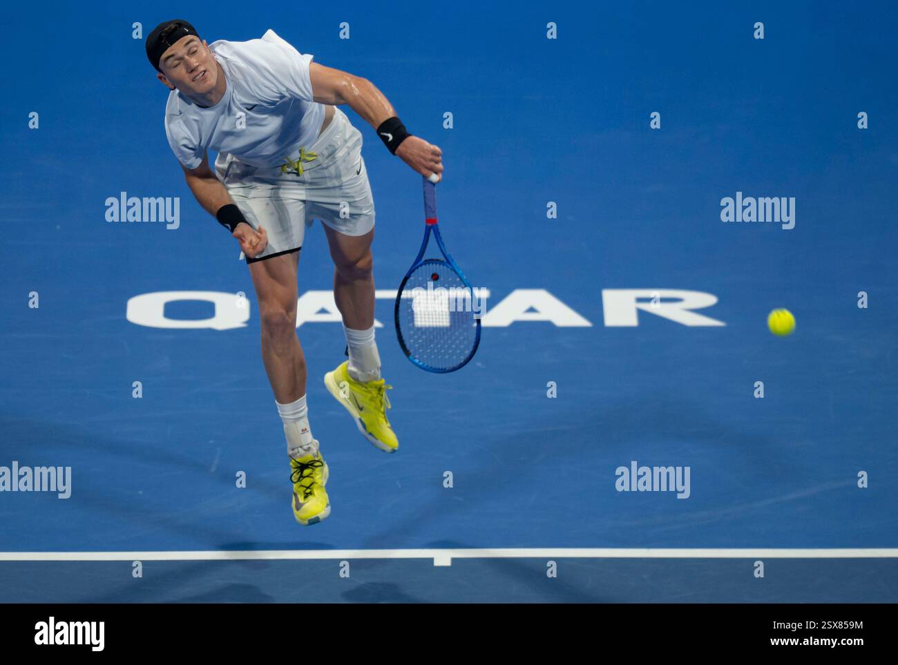 Doha, Qatar. 22nd Feb, 2025. Jack Draper serves during the men's singles final match between ...