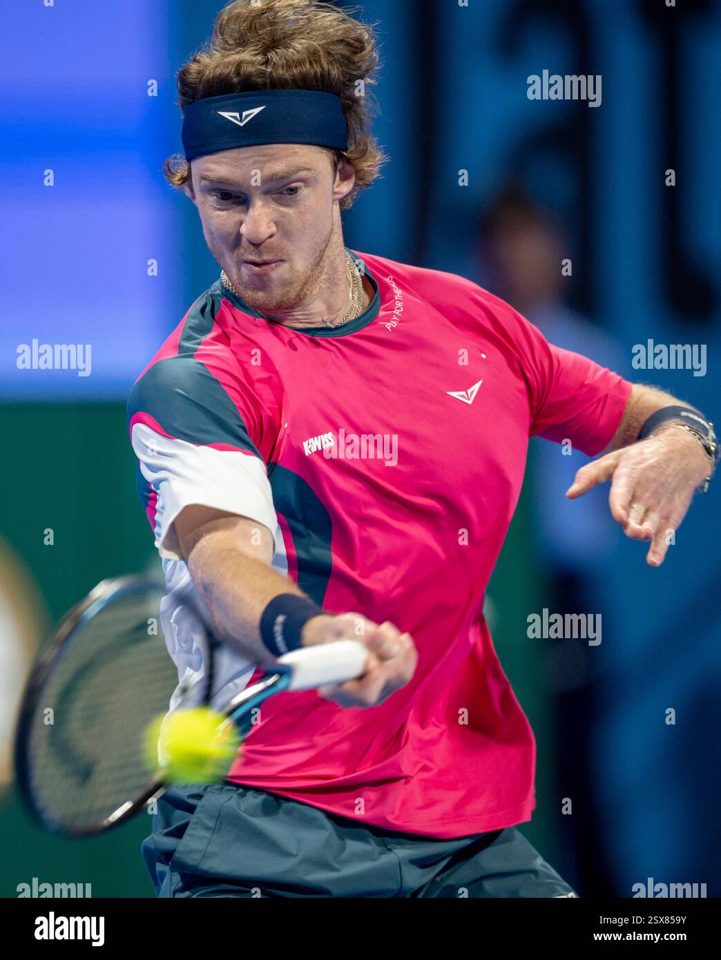 Doha, Qatar. 22nd Feb, 2025. Andrey Rublev hits a return during the men's singles final match ...